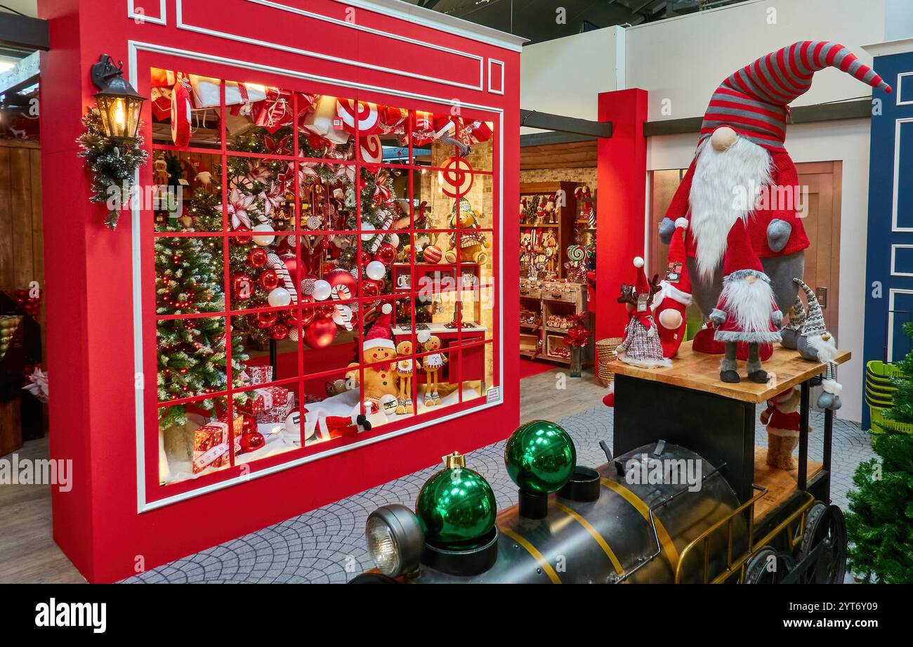 Christmas trees and decorations with festive window displays Stock ...