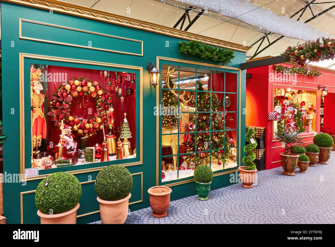 Christmas trees and decorations with festive window displays Stock ...