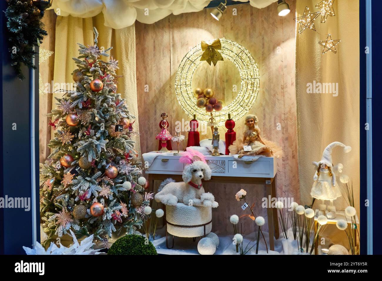 Christmas trees and decorations with festive window displays Stock ...