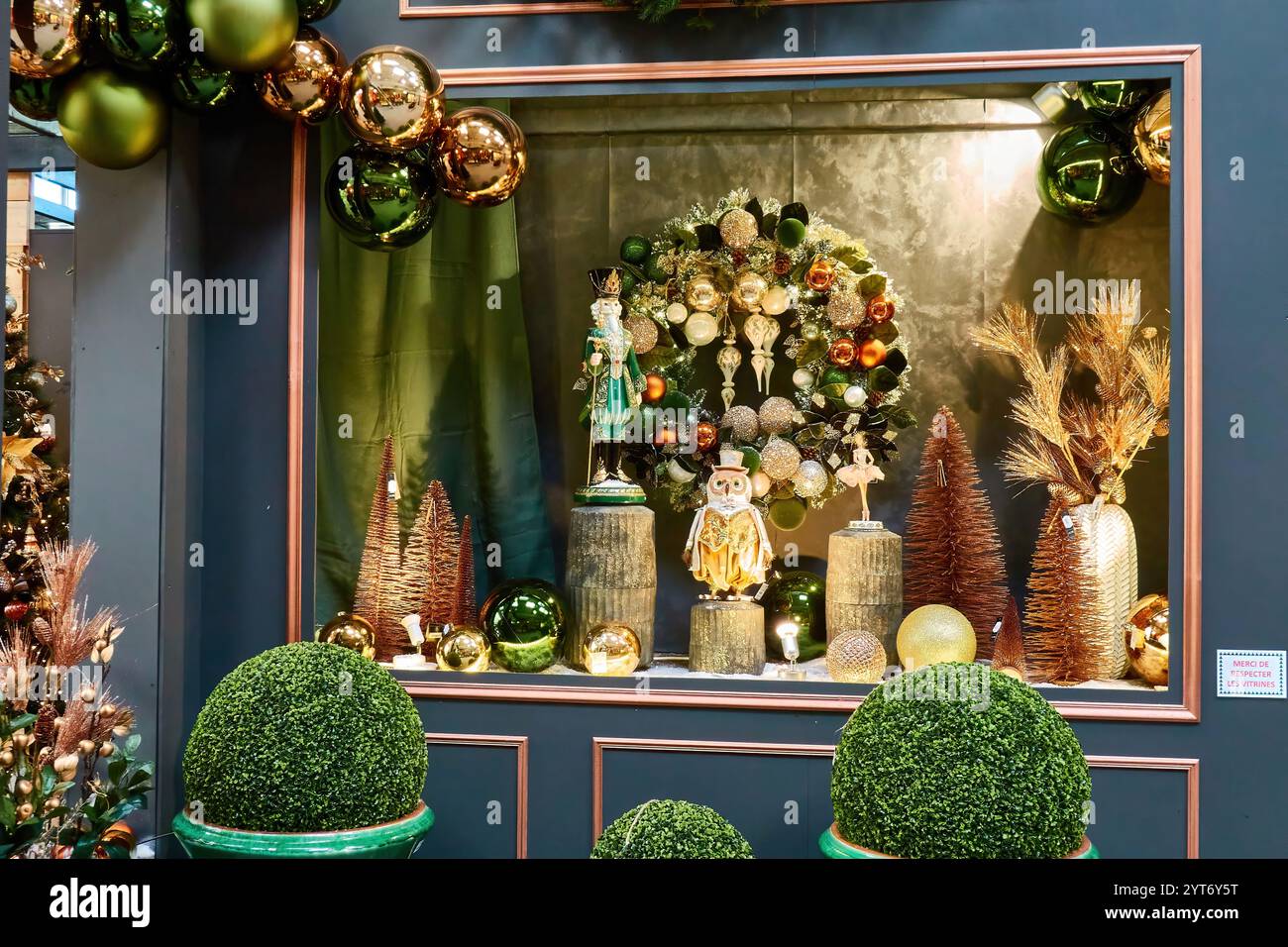 Christmas trees and decorations with festive window displays Stock ...