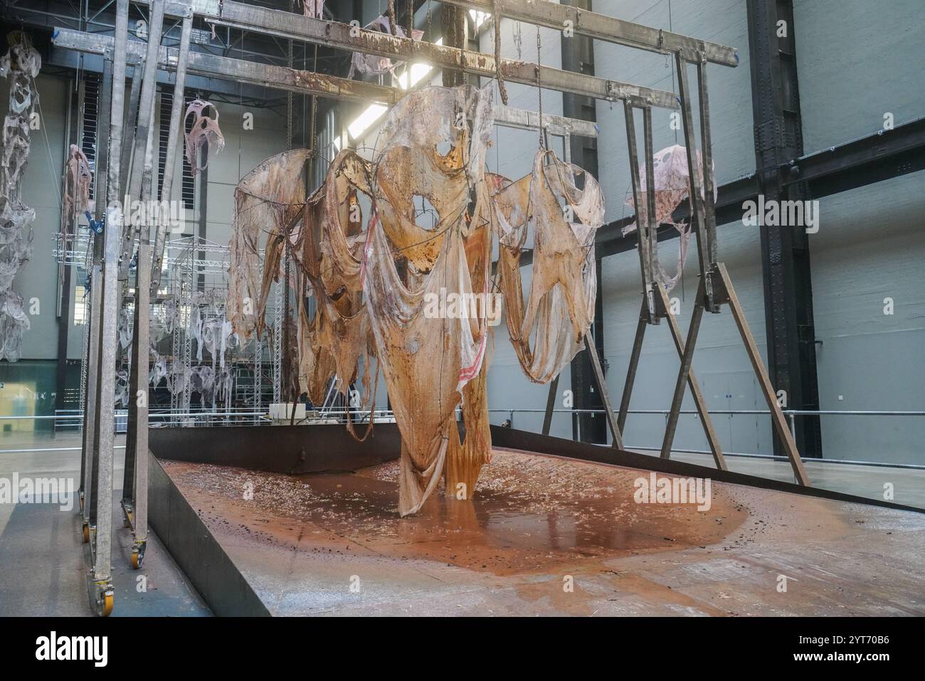 Open Wound with fabric hanging sculptures and mechanical installations ...