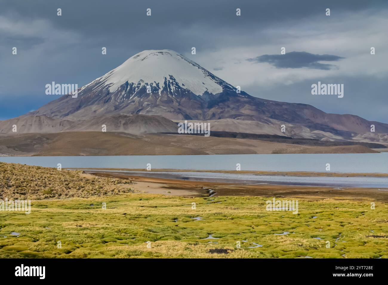 Parinacota volcano in Chile and Bolivia border. Volcanic cone summit ...