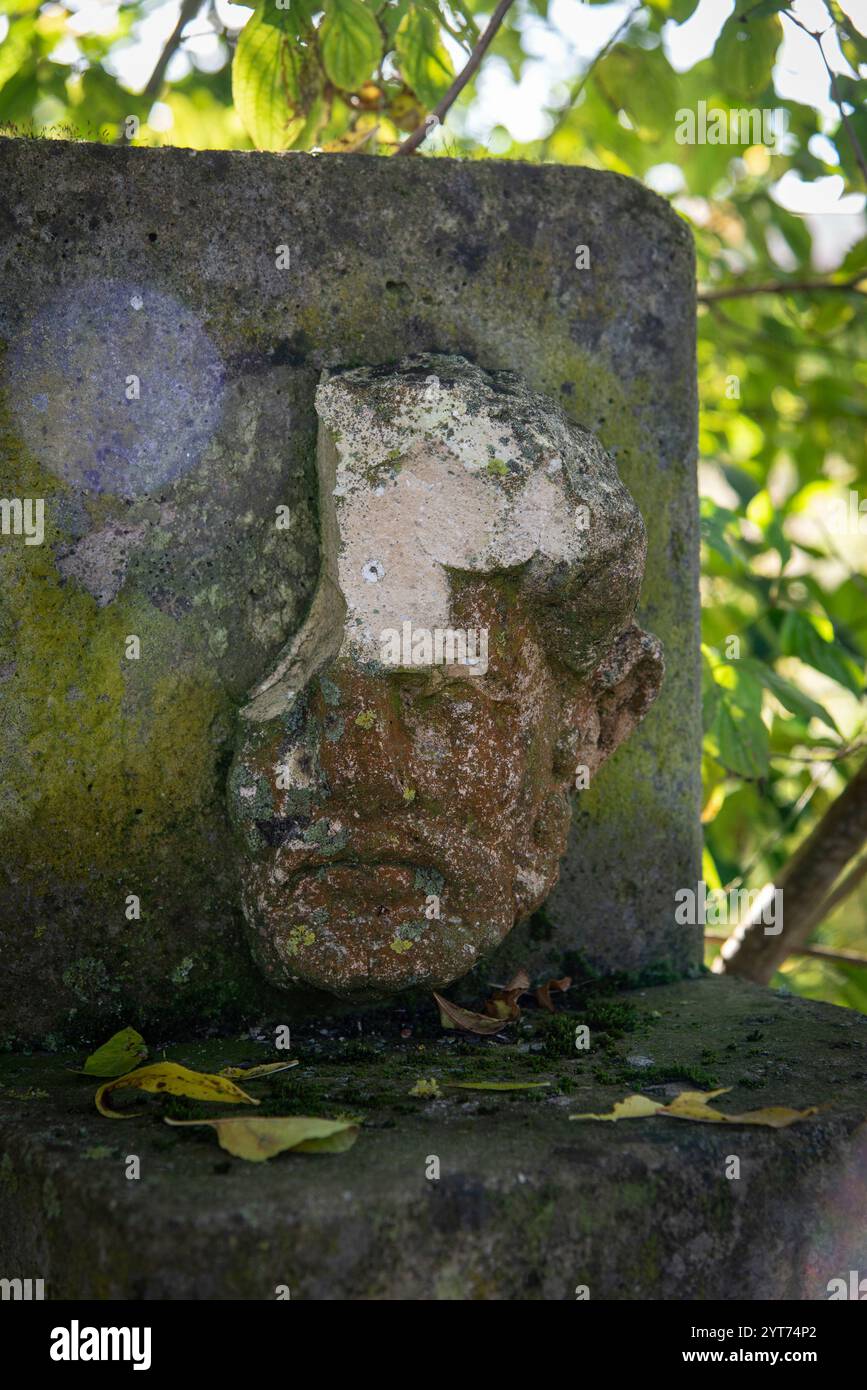 Damaged sculpture of a head Stock Photo - Alamy