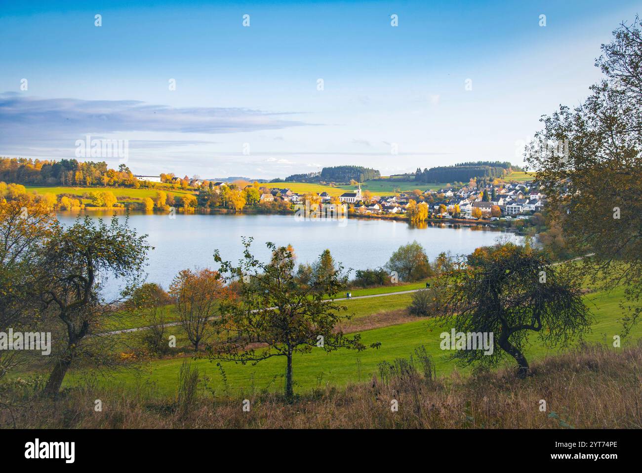 View of the Schalkenmehrener Maar near Daun in sunny weather in the ...