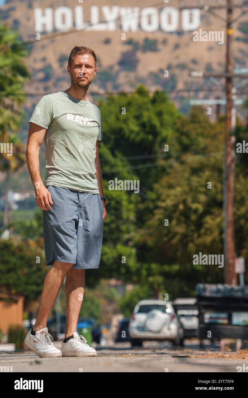 Man in Casual Attire with Hollywood Sign in Los Angeles Background ...