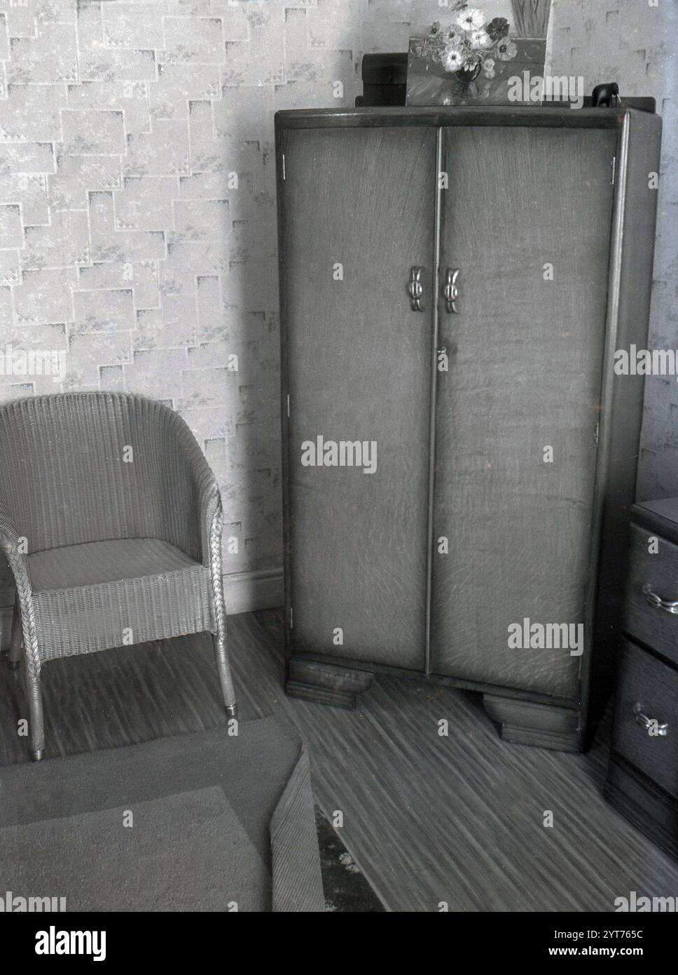 1950s, historical, bedroom interior, patterned wall paper, small wicker ...