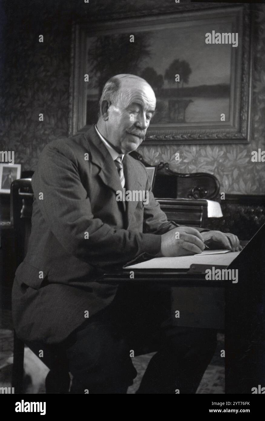 circa 1930s, historical, inside a drawing room, a distinguished elderly ...