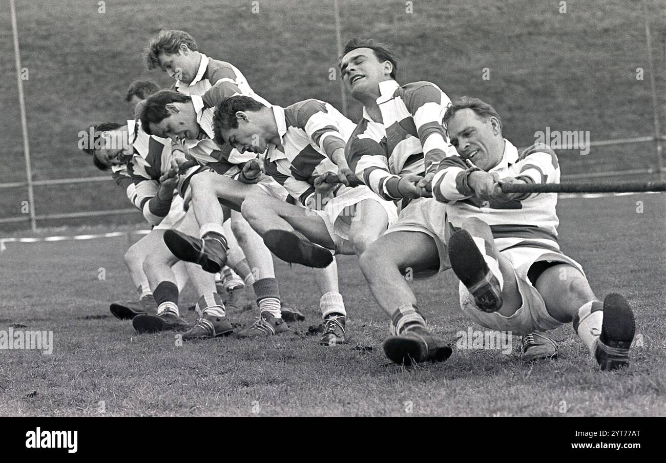 1968, historical, a group of men in hooped rugby jerseys and shorts ...