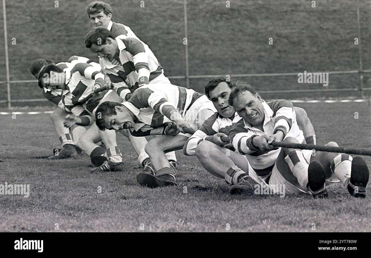 1968, historical, a team of men, in hooped rugby jerseys and shorts ...