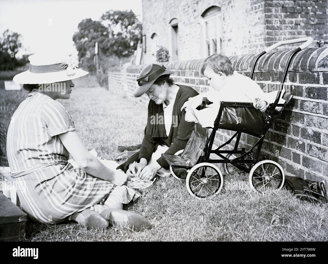 circa 1930s, historical, two ladies in clothes of the era and wearnig ...