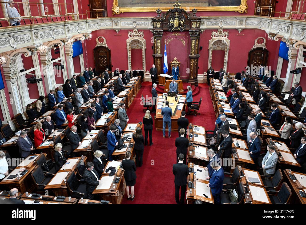 Quebec, Canada. 06th Dec, 2024. Members of the National Assembly stand ...