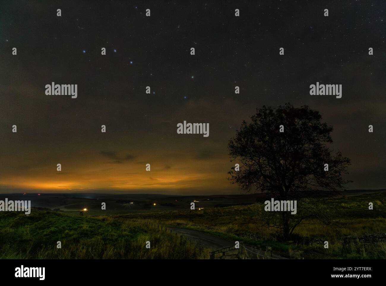 Hadrian's Wall (Caw Gap) looking north with airglow lighting the starry ...