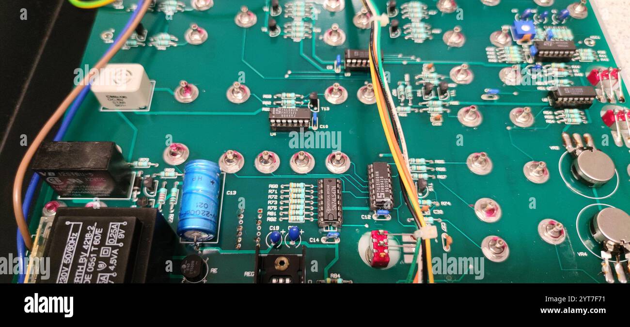 Electronic circuit board with many resistors, capacitors, wires and ...