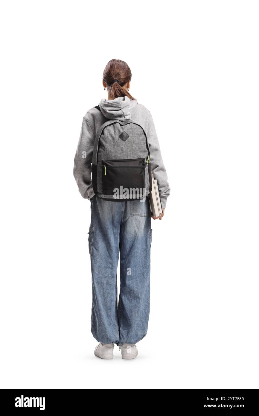 Rear view shot of a female student with a backpack isolated on white ...
