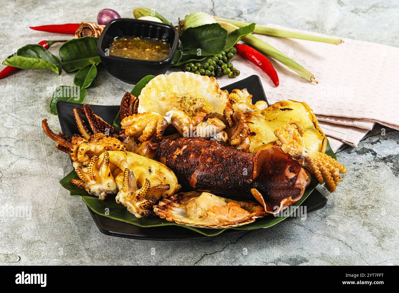 Asian grilled seafood mix plate - squid, cuttlefish, scallops and ...