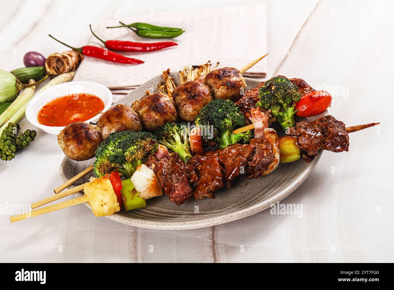 Asian grilled skewer assortment satay with beef, porl, chicken and ...