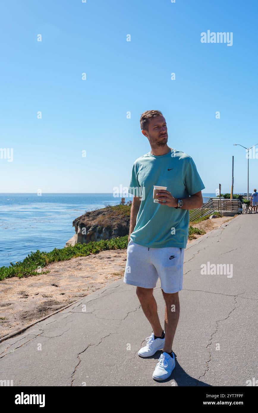 Man on Coastal Path Overlooking Ocean in Santa Cruz, California Stock ...