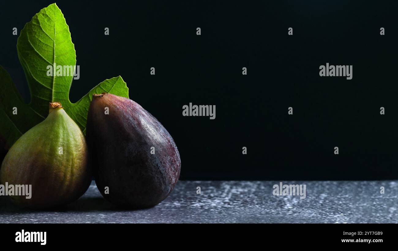minimalist composition showcasing two ripe figs alongside a vibrant ...