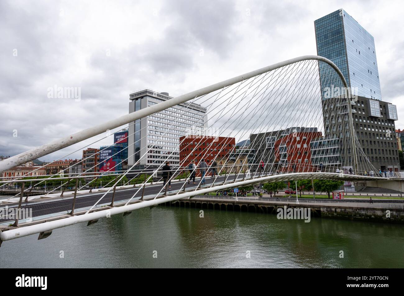 Bilbao, Spain- May 27, 2024: Zubizuri Pedestrian bridge over the river ...
