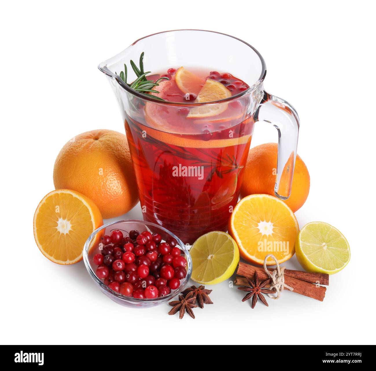 Aromatic punch drink in glass jug and ingredients on white background ...