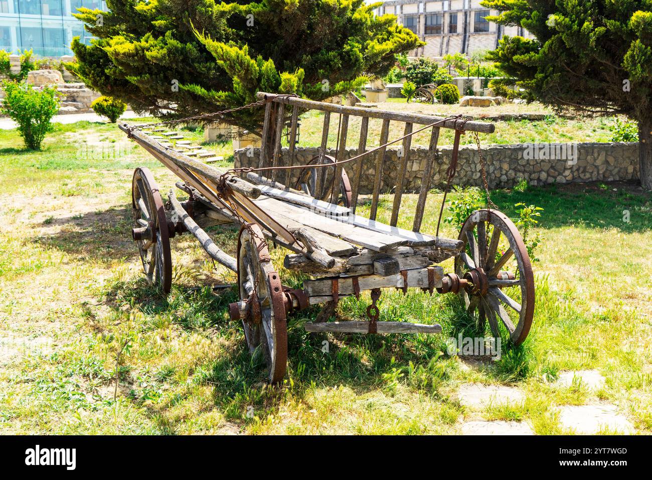 Old abandoned wooden cart in a forest glade in the village Stock Photo ...