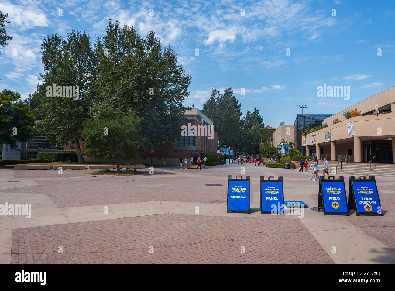 Visitors navigate UCLA campus in Los Angeles, California, with blue ...