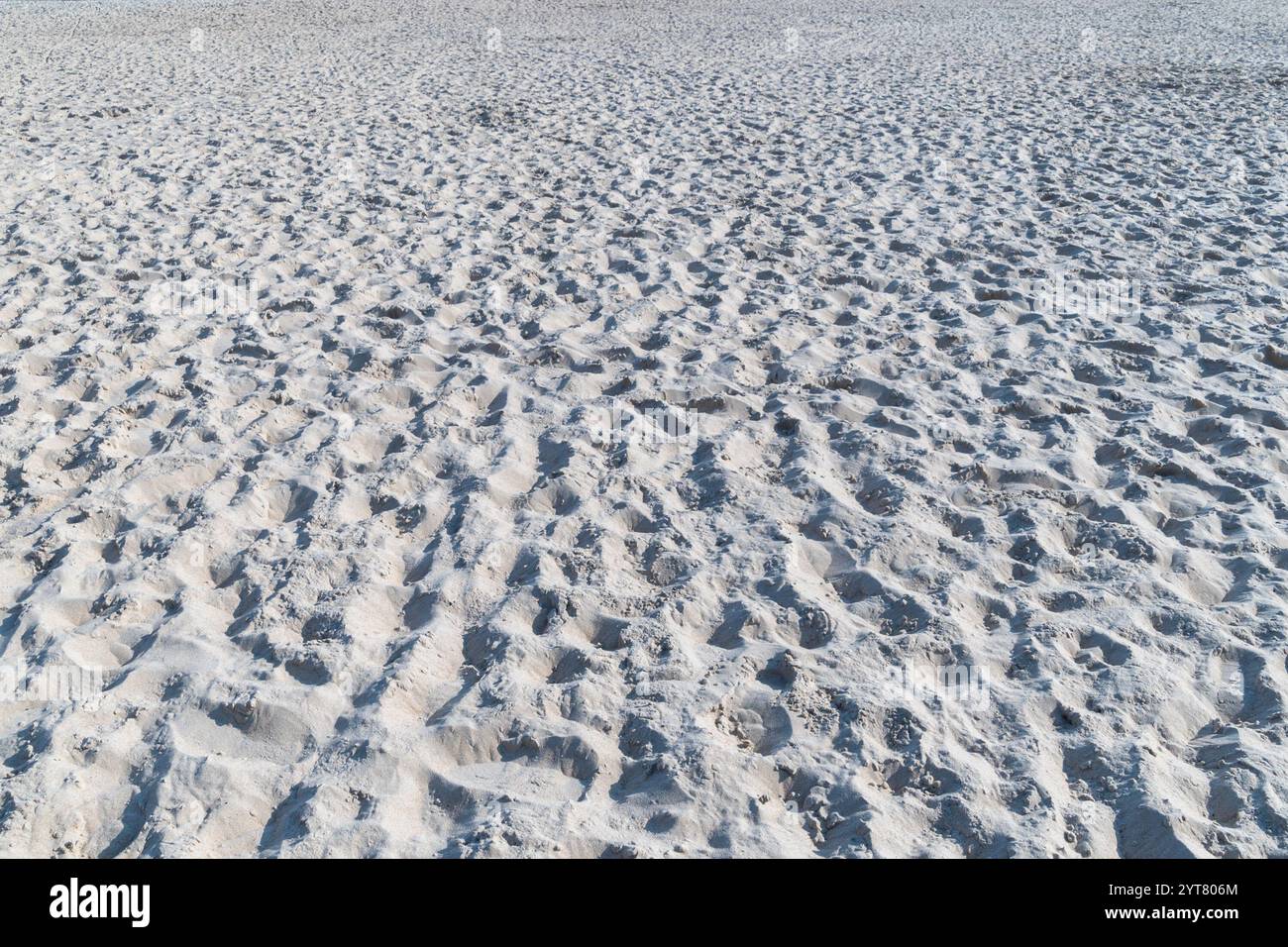 Sandy beach with footprints. Natural background. Seaside vacation Stock ...