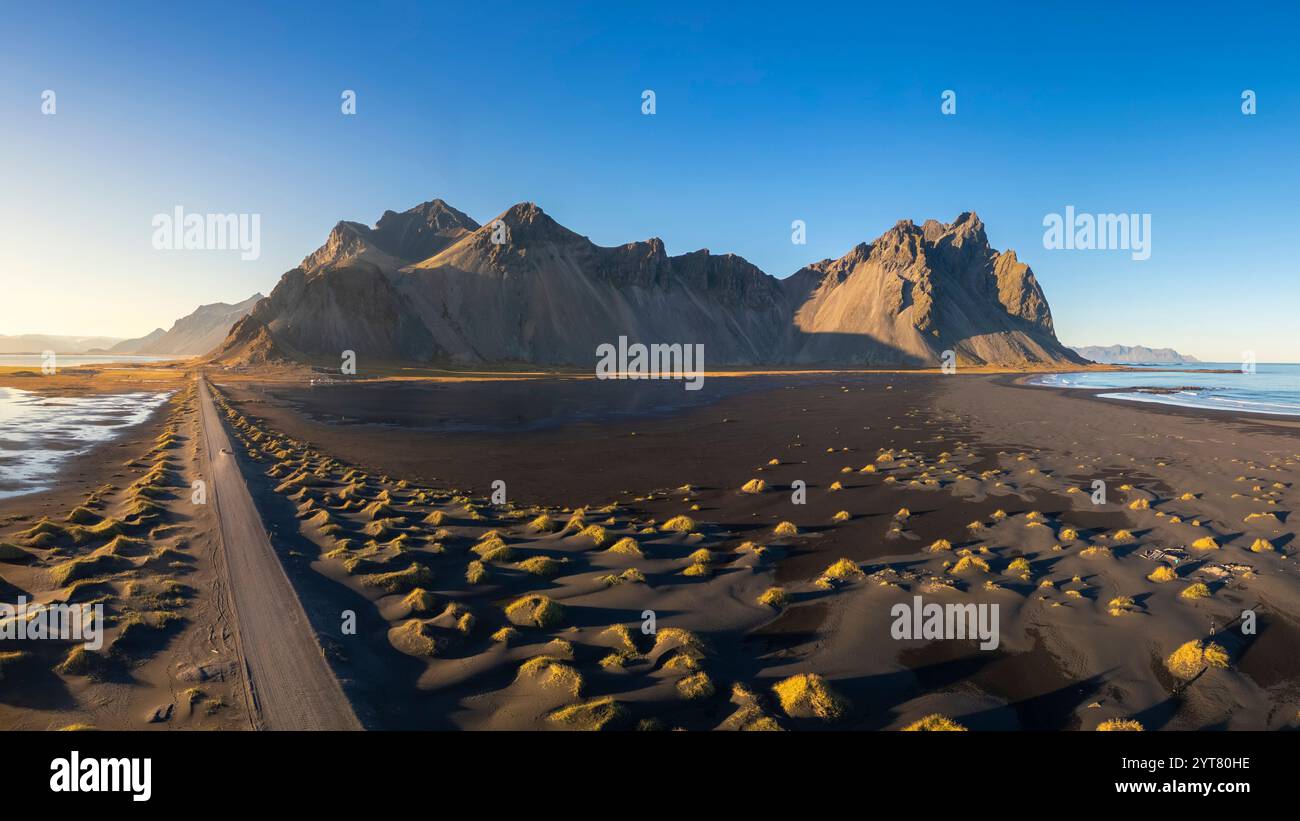 Aerial view of the black sand dunes in front of Vestrahorn mountain ...