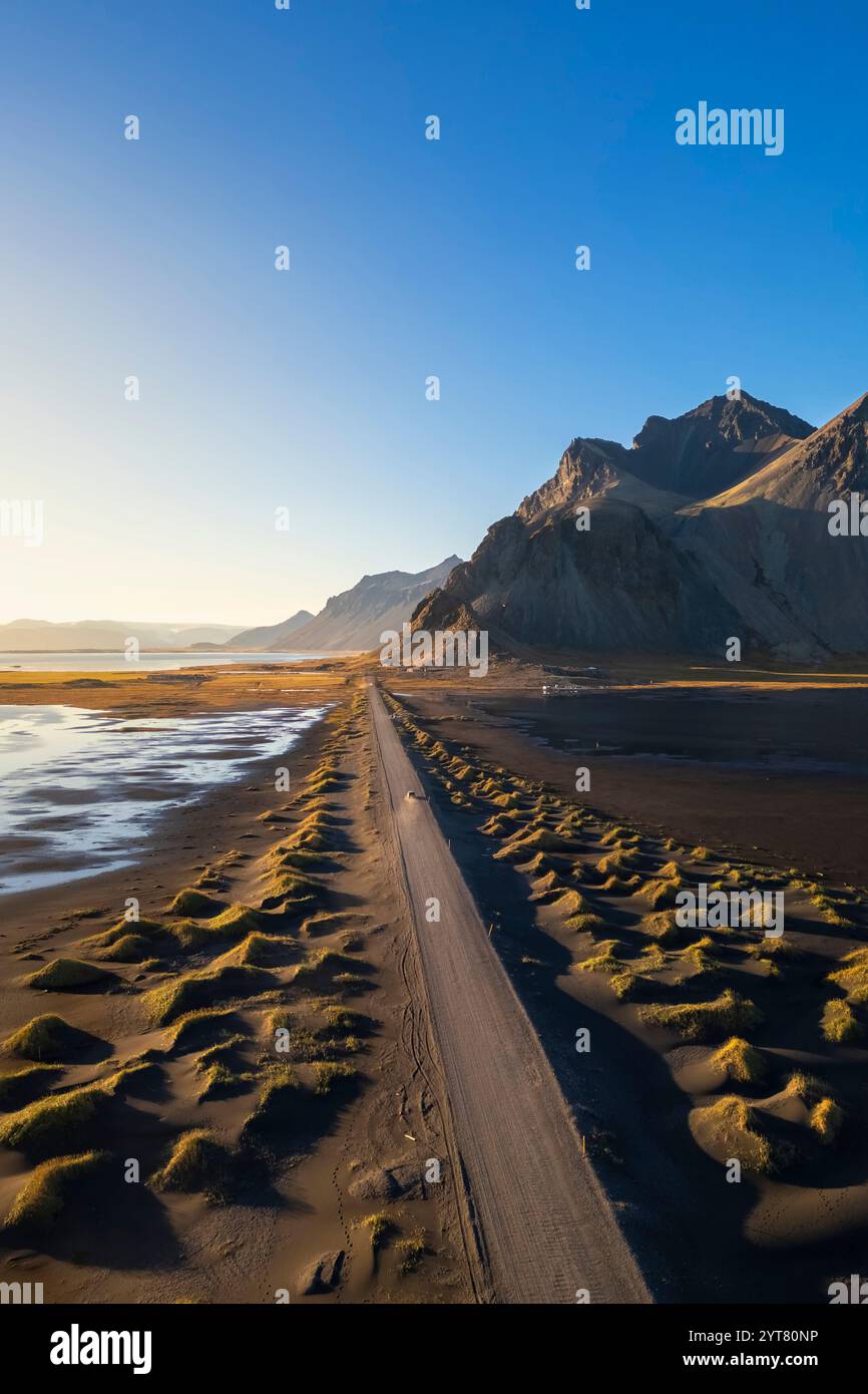 Aerial view of the black sand dunes in front of Vestrahorn mountain ...