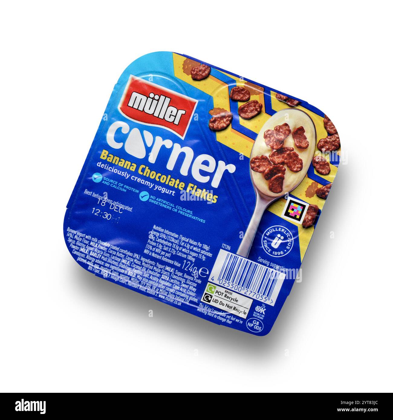 Pot of Muller Banana Flavour Yogurt with chocolate flakes pot top view ...