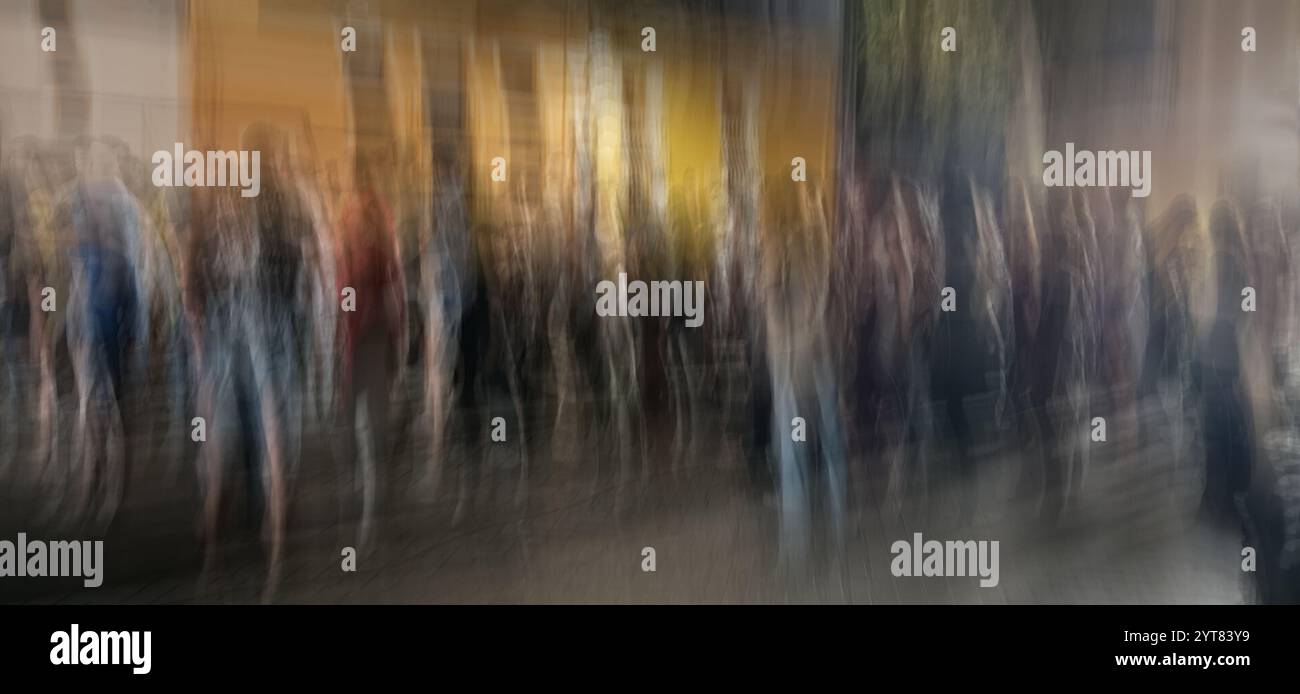 An impressionistic image of people at a busy street party in Denia ...