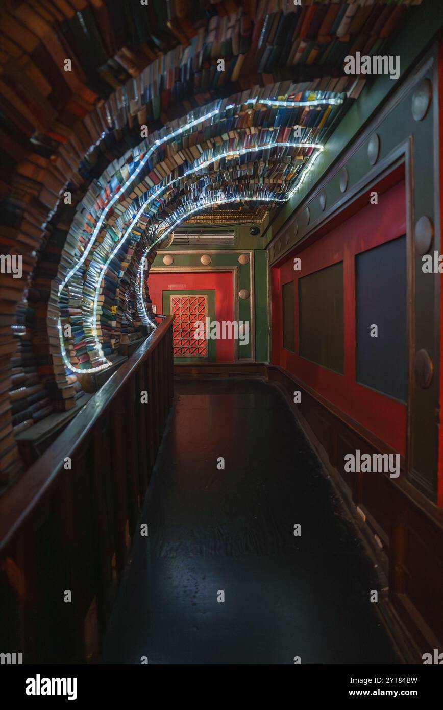 A hallway in The Last Bookstore features a tunnel of books on the ...