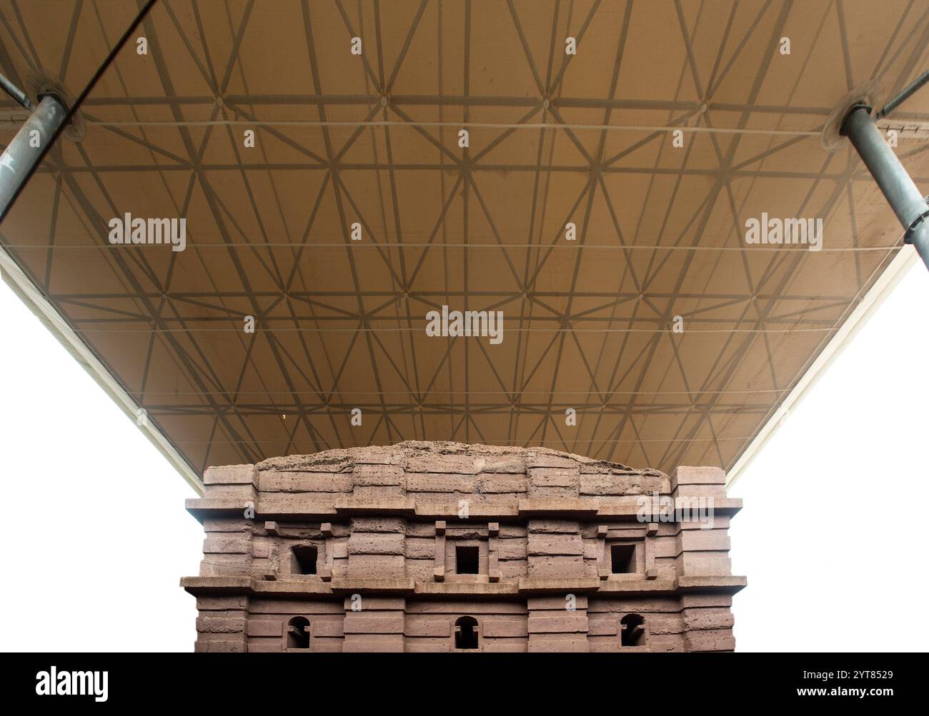 Monumental canopy over the monolithic rock church of Biete Amanuel ...