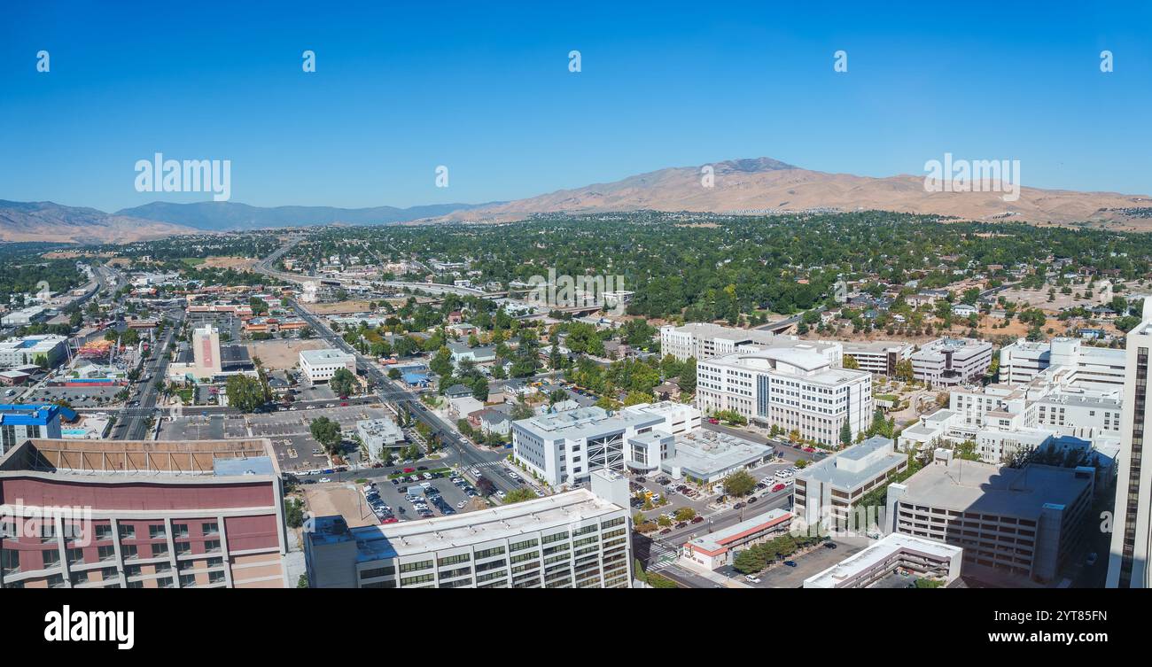 Reno, Nevada's downtown area features modern buildings under a clear ...