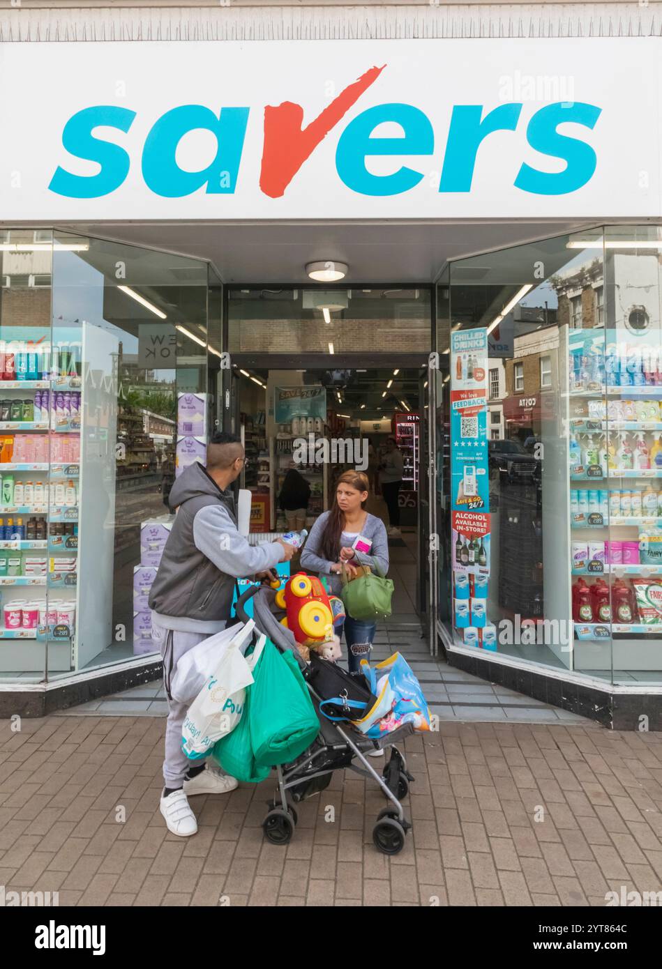 England, Kent, Dover, Street Scene, Immigrant Couple Shopping Stock ...