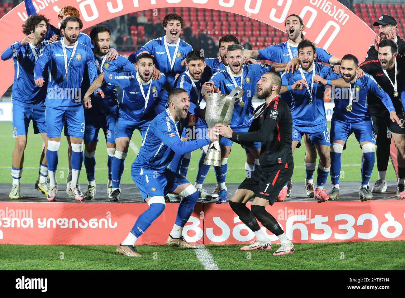 The players of FC Spaeri celebrate their victory after the Georgian Cup ...