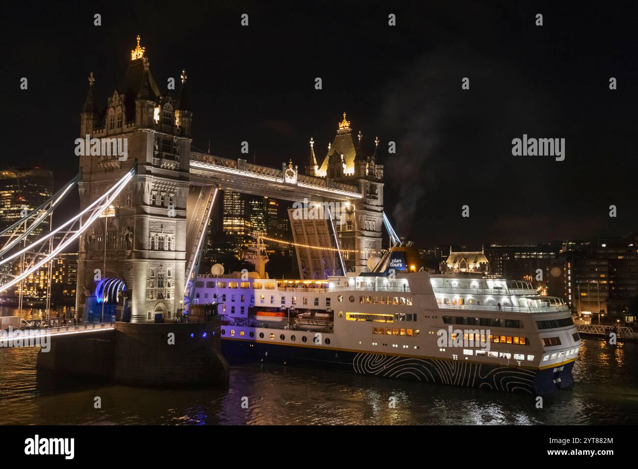 England, London, Cruise Ship Passing Through Open Tower Bridge at Night ...