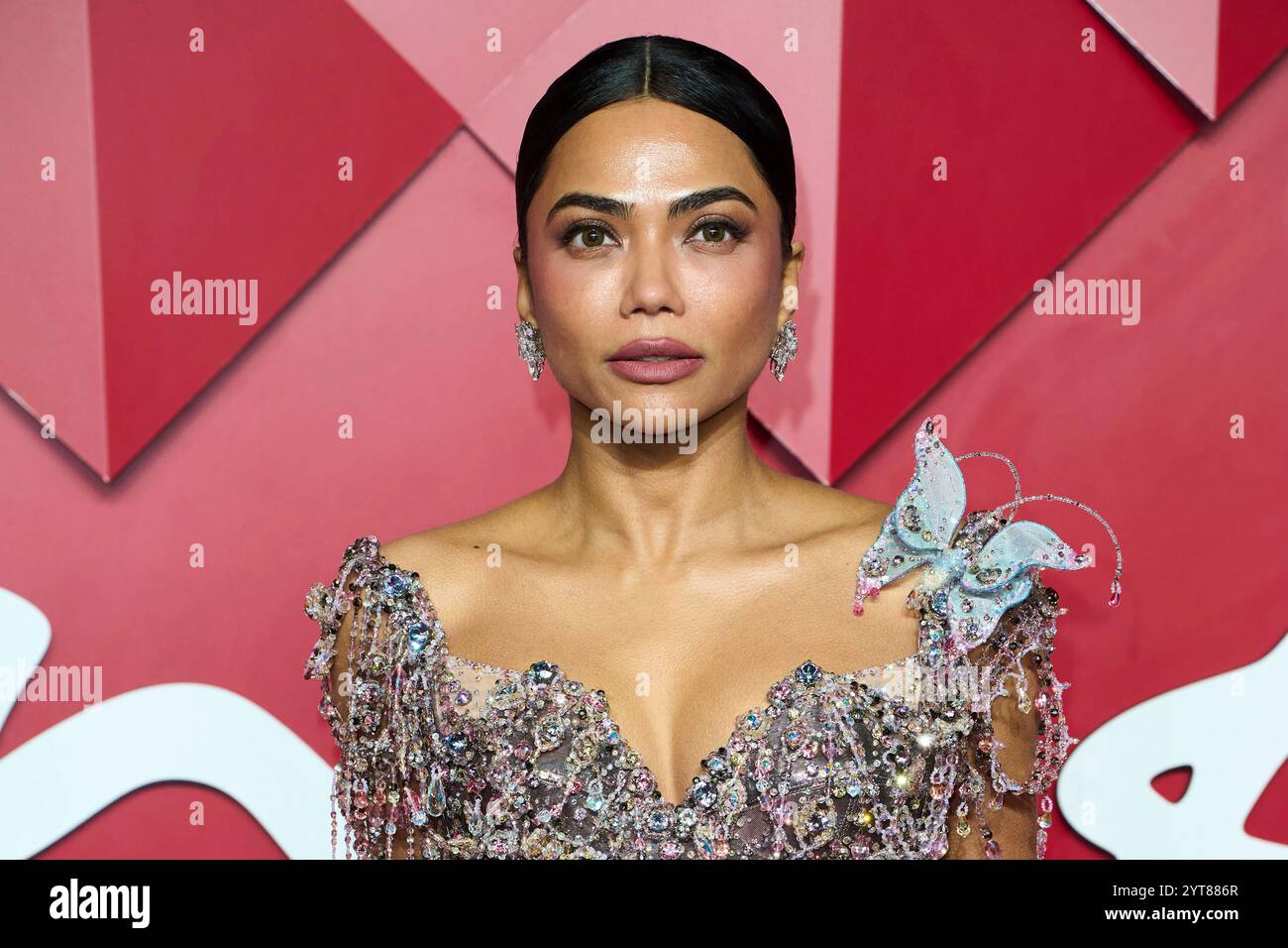 Mona Patel poses for photographers upon arrival at the The Fashion ...