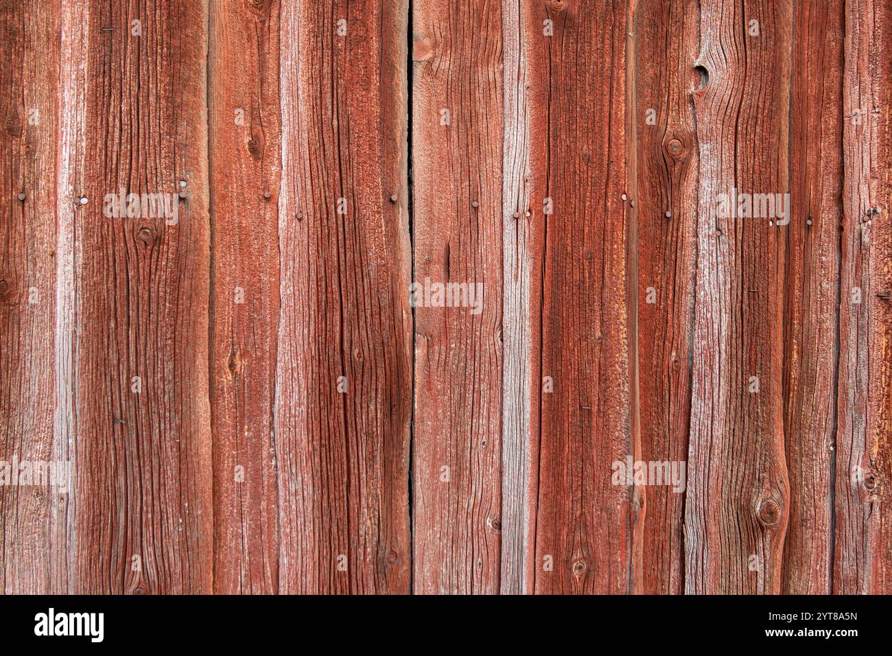 Old weathered boards from a wall, textured wood, red color, background ...