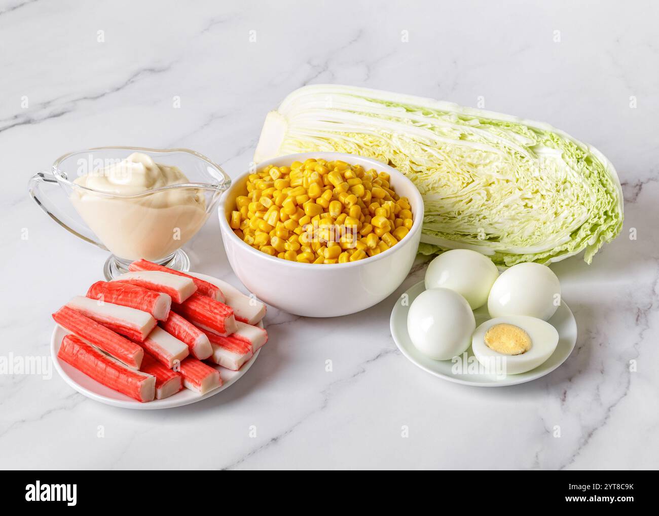Ingredients for salad: canned sweet corn, surimi sticks, fresh napa ...