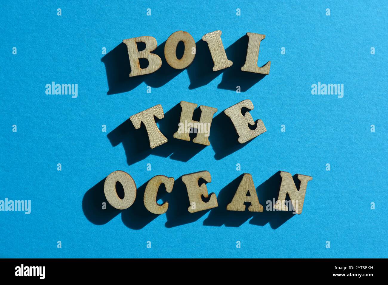 Boil The Ocean, words in wooden alphabet letters isolated on background ...
