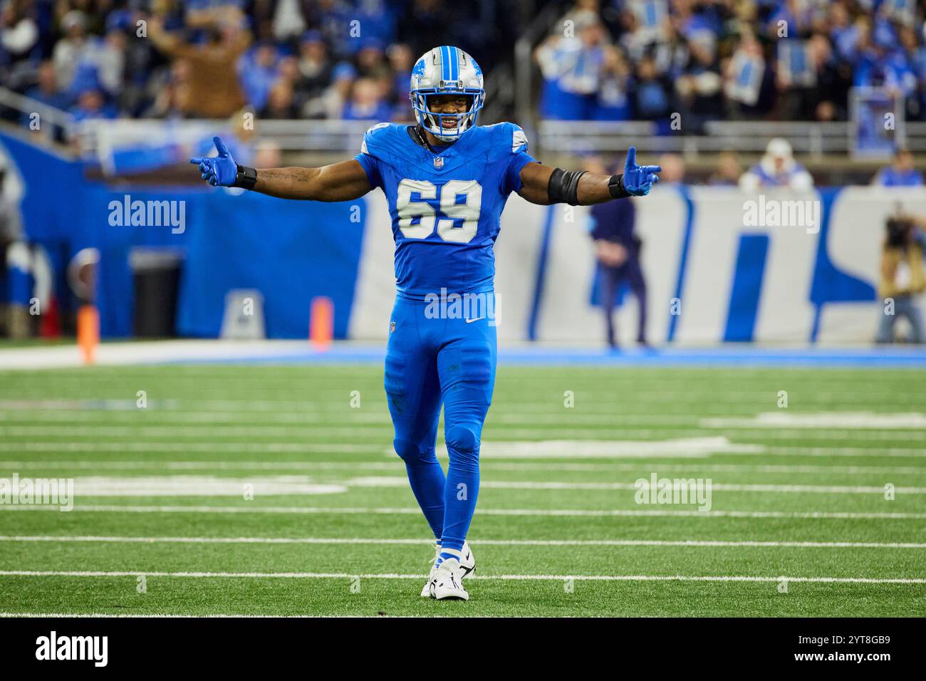 Detroit Lions linebacker Al-Quadin Muhammad (69) celebrates against the ...