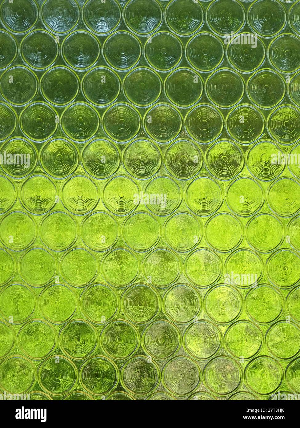 Green bottle bottom glass window Stock Photo - Alamy