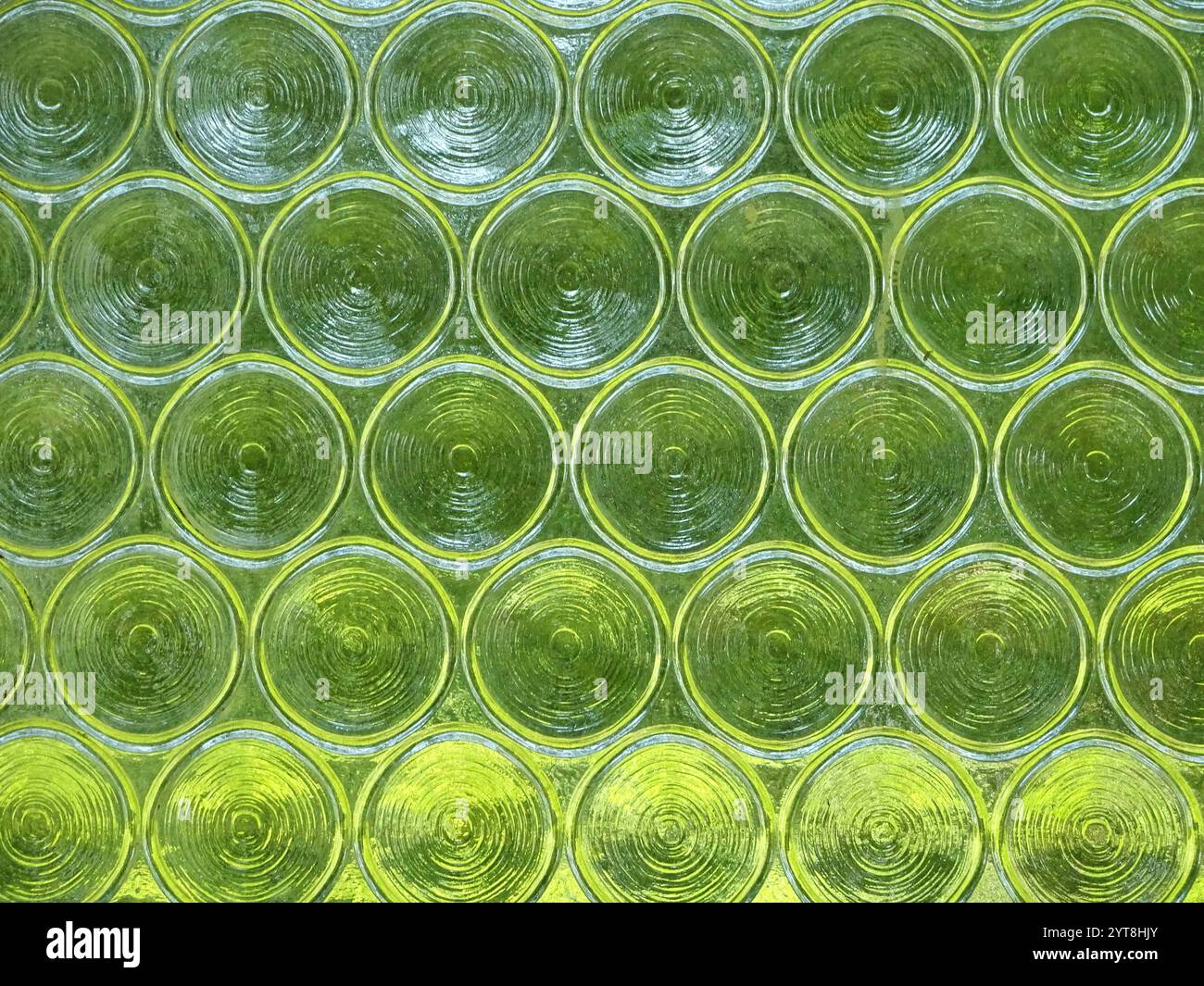 Green bottle bottom glass window Stock Photo - Alamy
