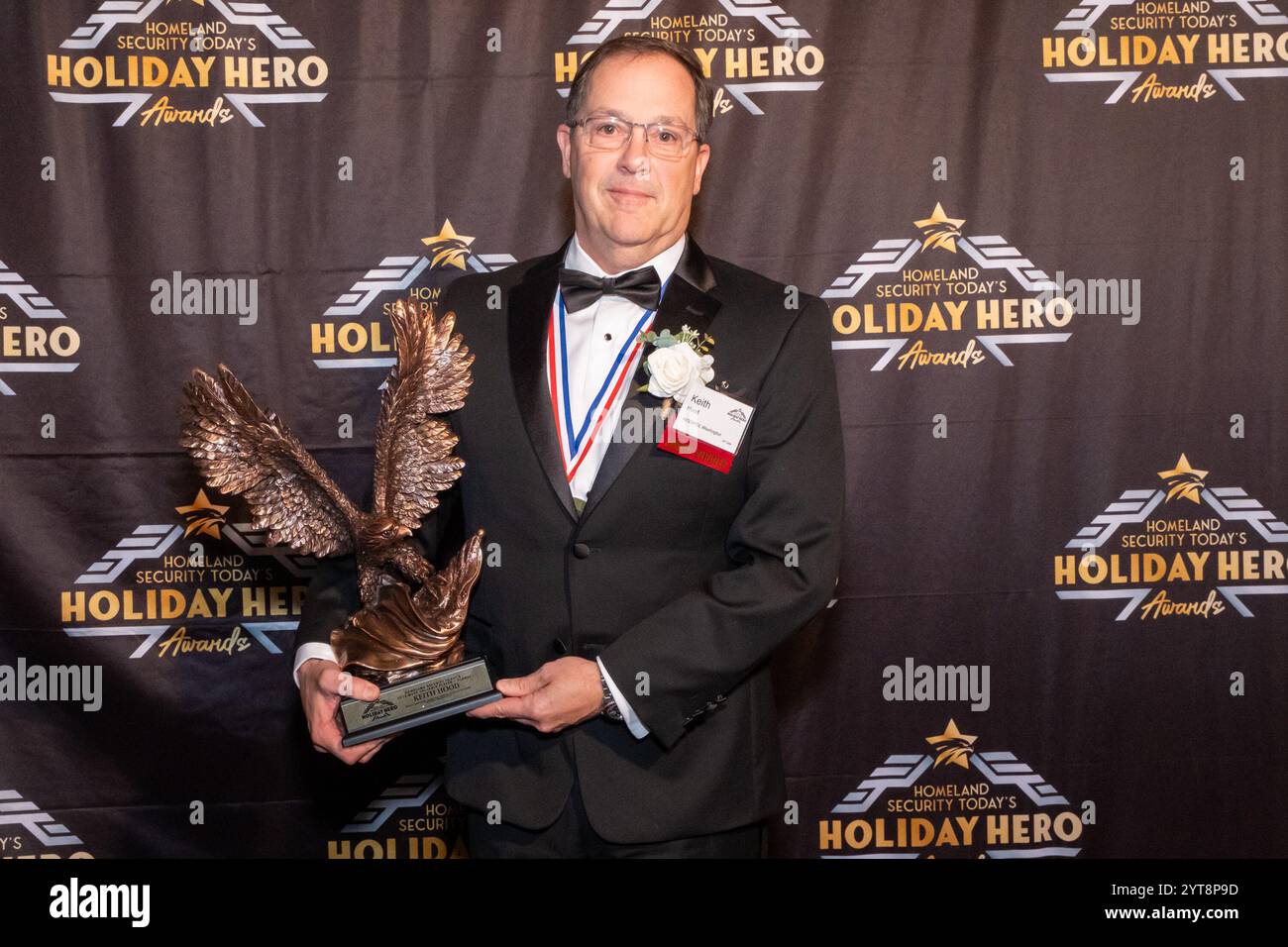 Kalya White presents Keith Hood, Deputy Assistant Director, Border ...