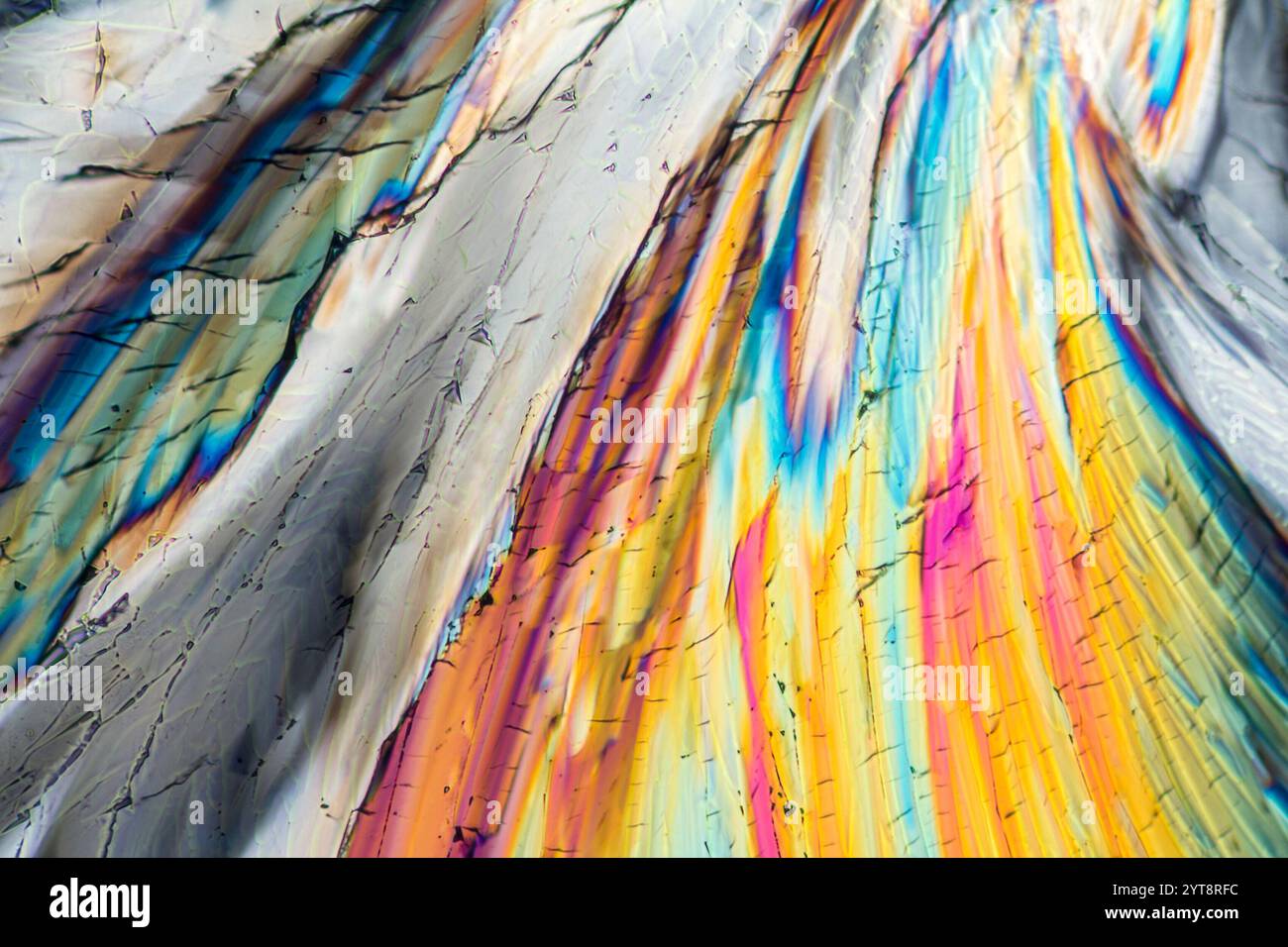 Colorful microscopic shot of sugar micro crystals in polarized light ...