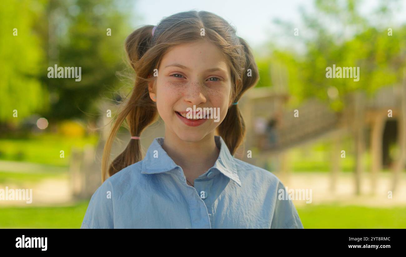 Outdoor portrait Caucasian pretty girl smile young teen lady female ...