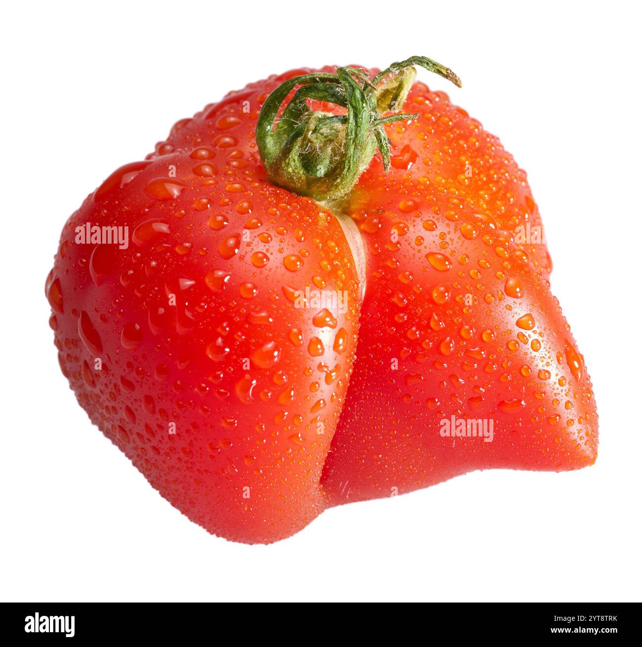 Strange shaped red wet tomato in white back Stock Photo - Alamy
