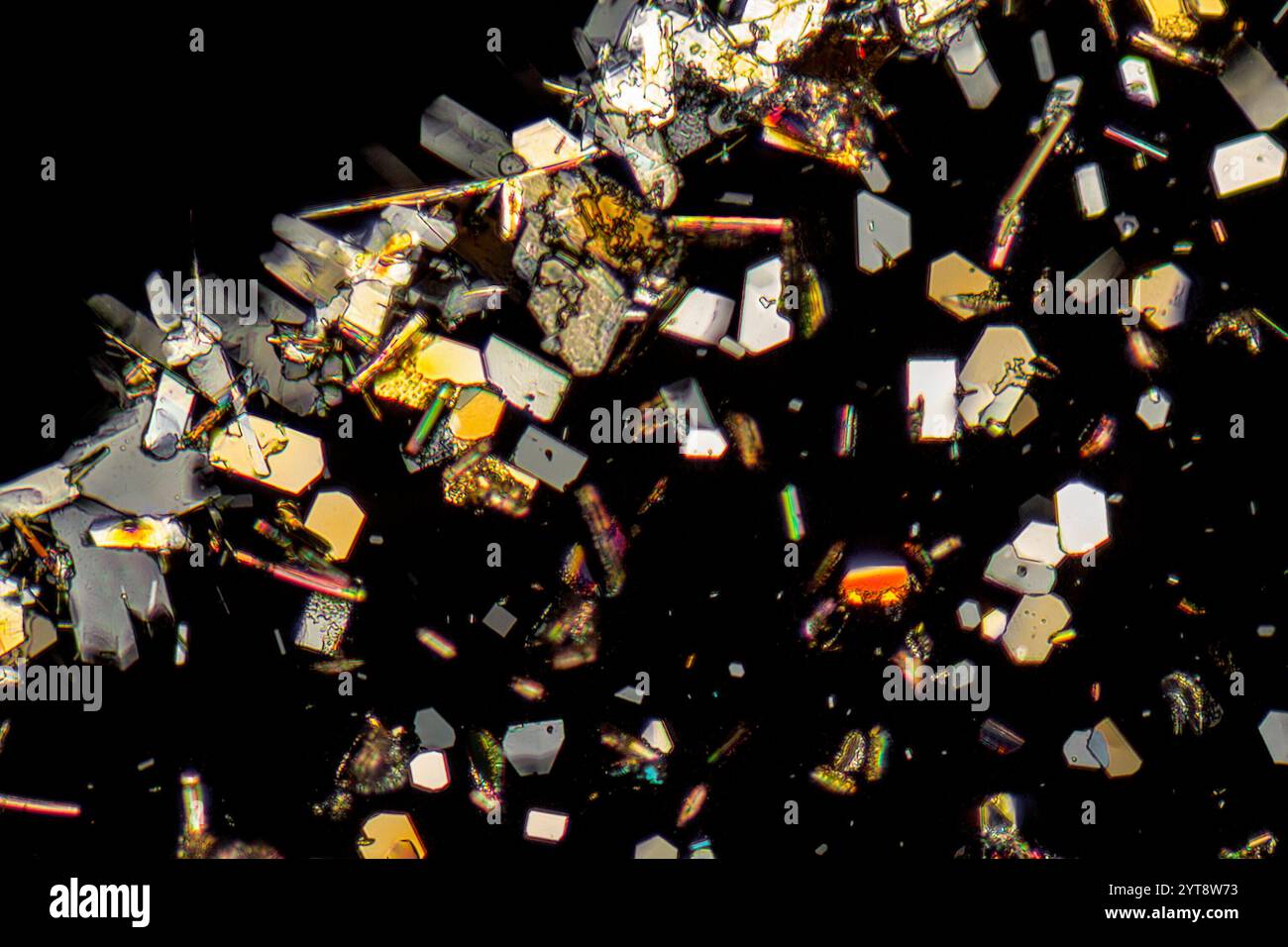 Microscopic shot showing colorful microcrystals in polarized light ...