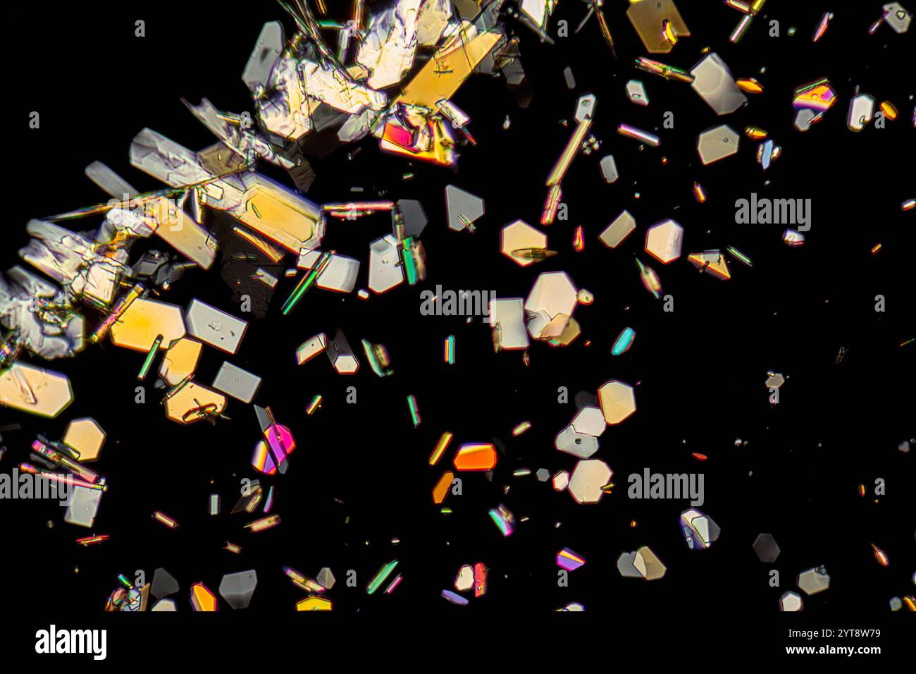Microscopic shot showing colorful microcrystals in polarized light ...